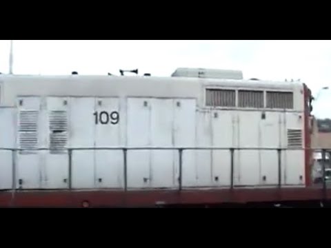 ICE grain train with FURX SD40-2 and ex-IMRL/Soo GP9. Oct. 2002. - YouTube