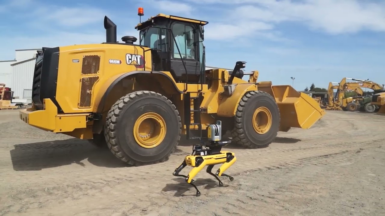 See Spot Walk with a Cat 966M Wheel Loader! - YouTube