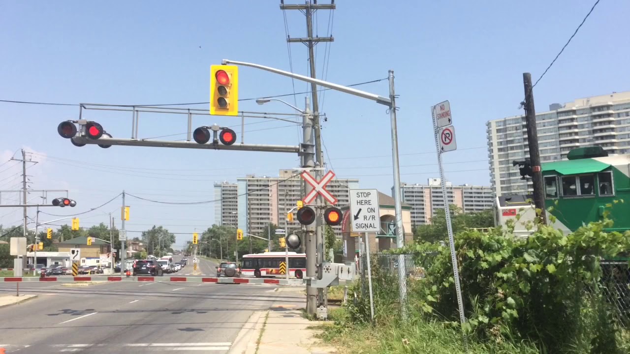 Rare crossing with traffic lights! And a GO train! - YouTube
