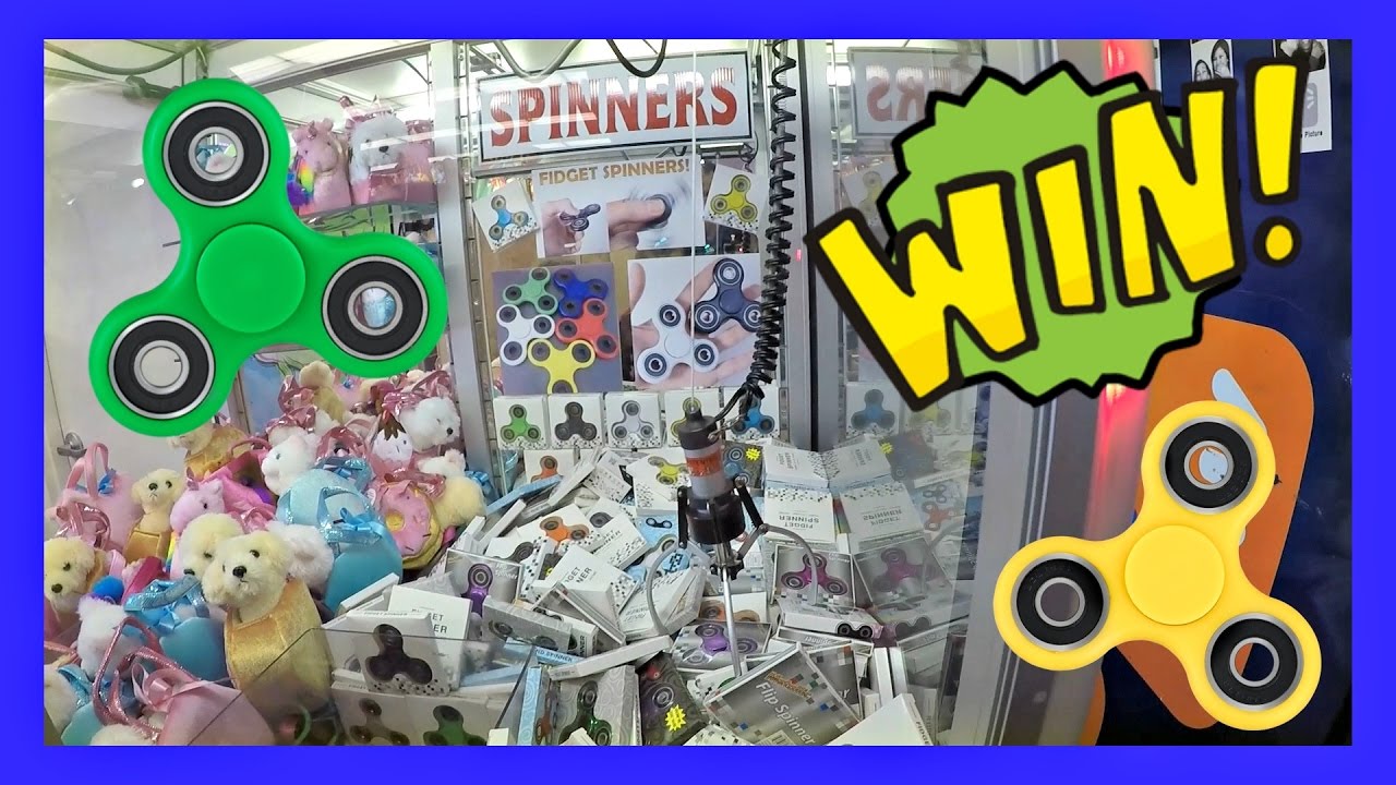 WINNING A FIDGET SPINNER IN A CLAW MACHINE! - YouTube