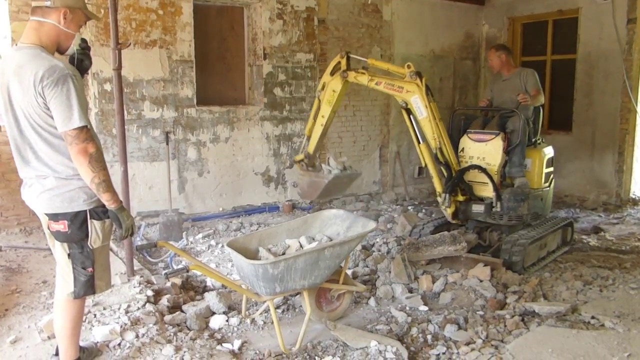 A mini-digger inside the house - YouTube