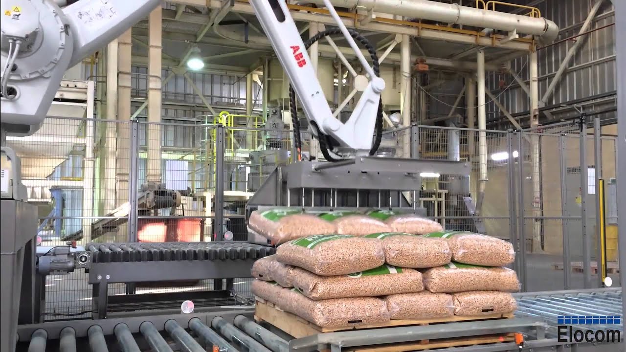 Wood pellet bagging line with robot up to 1400 bags / hour. - YouTube