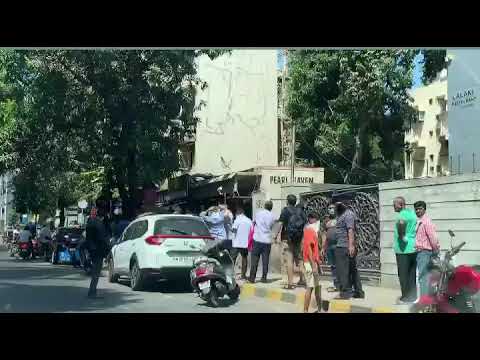 Serpentine queue outside a wine shop on Chapel Road in Bandra - YouTube