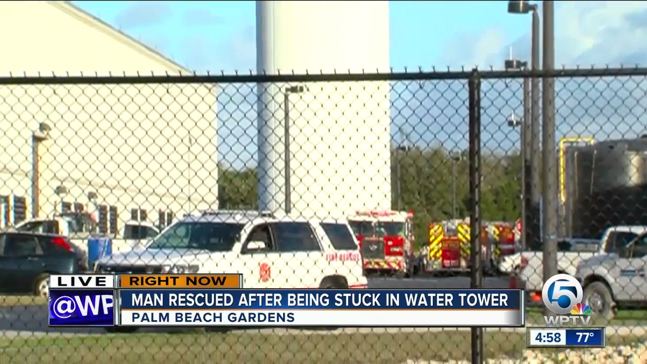 Man rescued after being stuck in water tower - YouTube