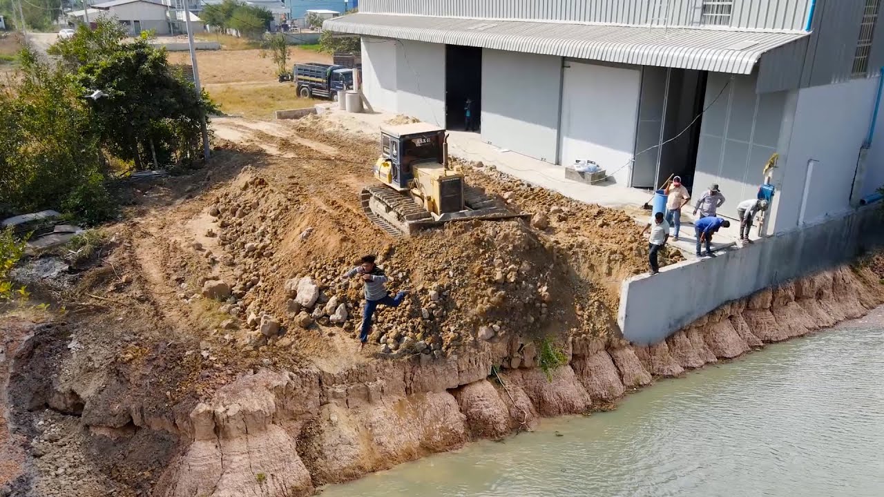 Nice Process! Excellent Bulldozer Push Soil and Dump Truck Transport Soil Filling Up In Front of ...