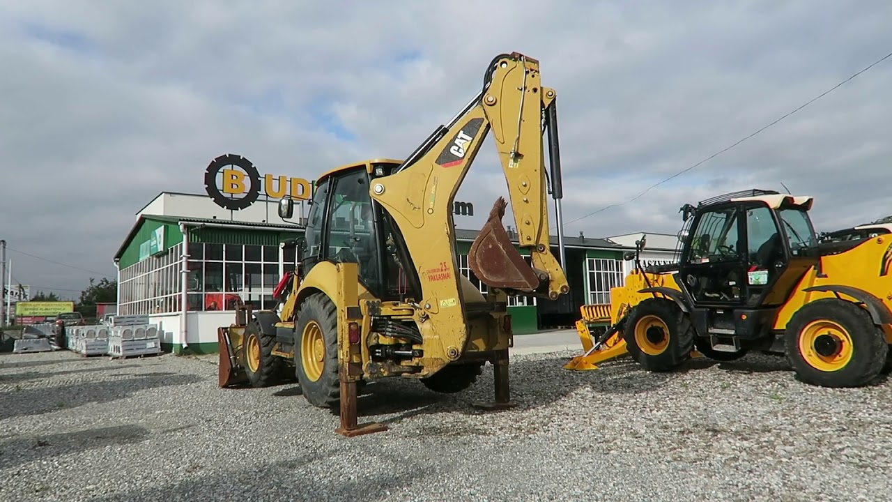 CAT 428F 2013 - YouTube