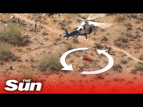 Stretcher SPINS out of control under rescue helicopter
