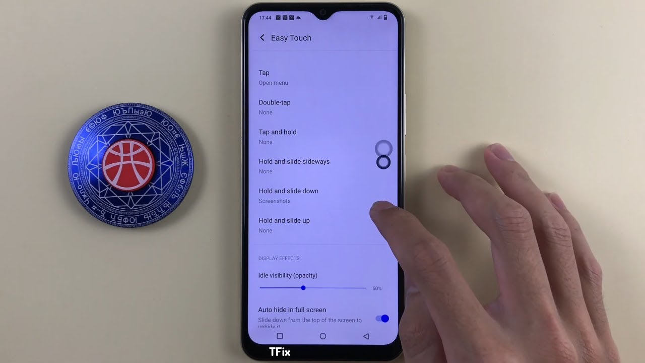 Take a screenshot while holding and sliding down the virtual Home ...