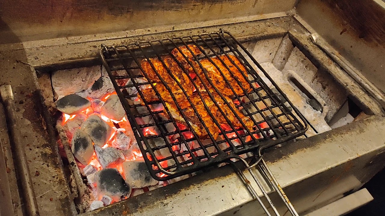 Coconut shell pillow briquettes burning. - YouTube