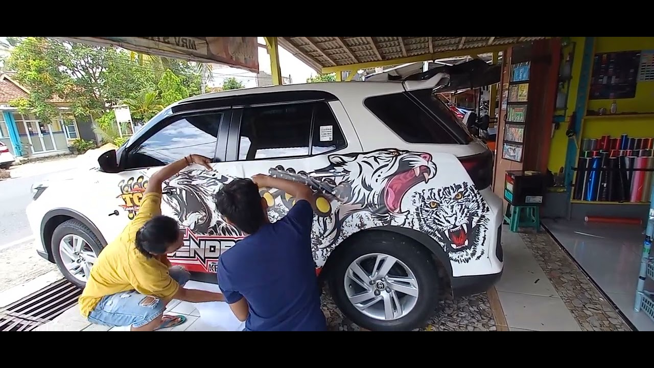 pemasangan decal di unit kevin sm pangandaran dengan tema harimau putih ...