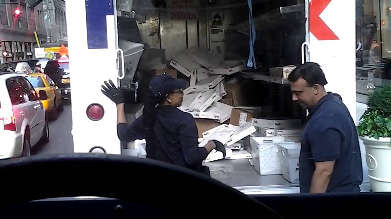 FedEx employee caught throwing packages - YouTube