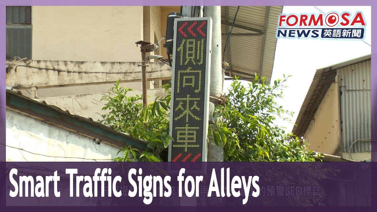 Smart traffic signs warn pedestrians of oncoming cars in narrow ...