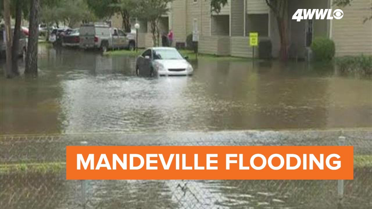 Mandeville floods with intense rain Tuesday - YouTube