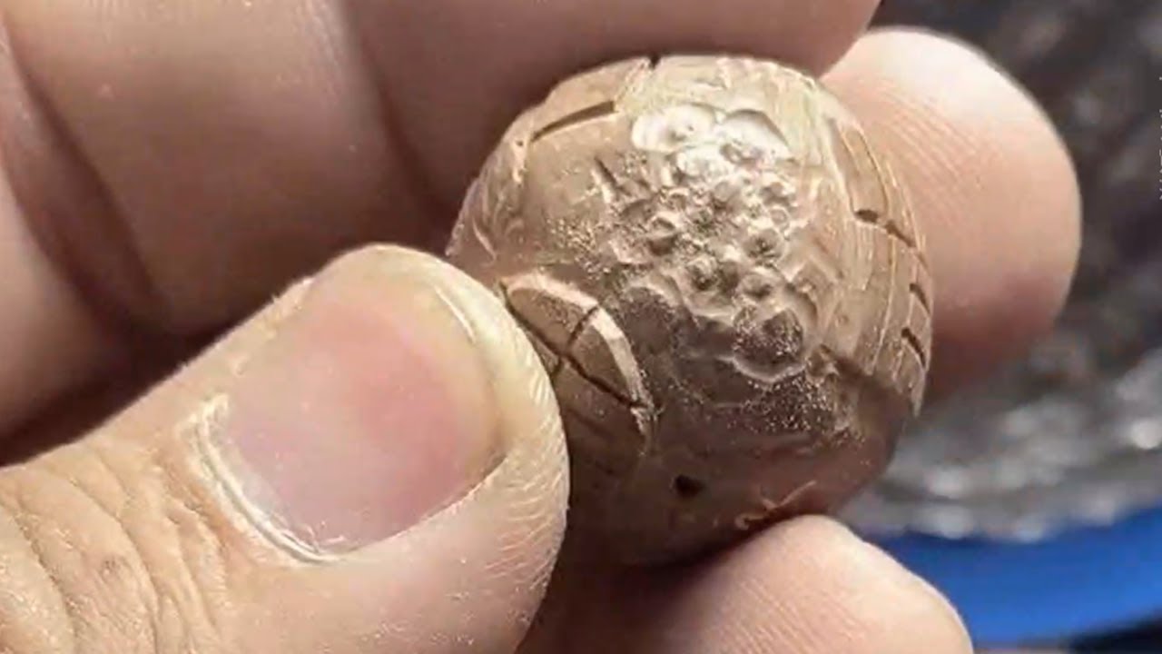 How to carve a beautiful artwork with a peach pit? - YouTube