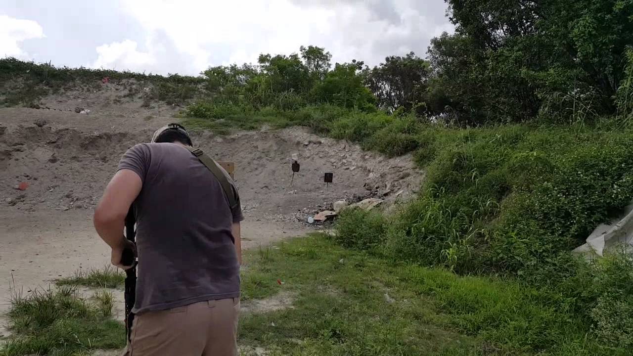 Rapid fire at henry's gun range - YouTube