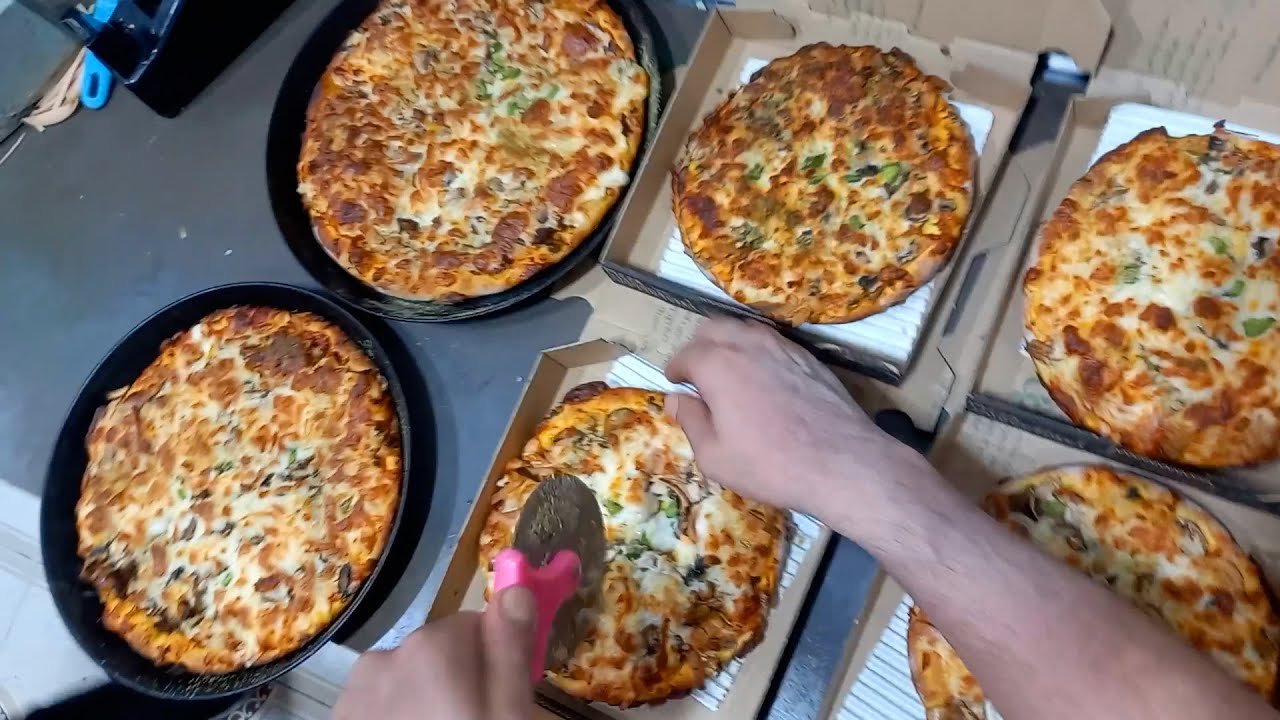 fast food POV: cooking incredible american PIZZA in Busy restaurant ...