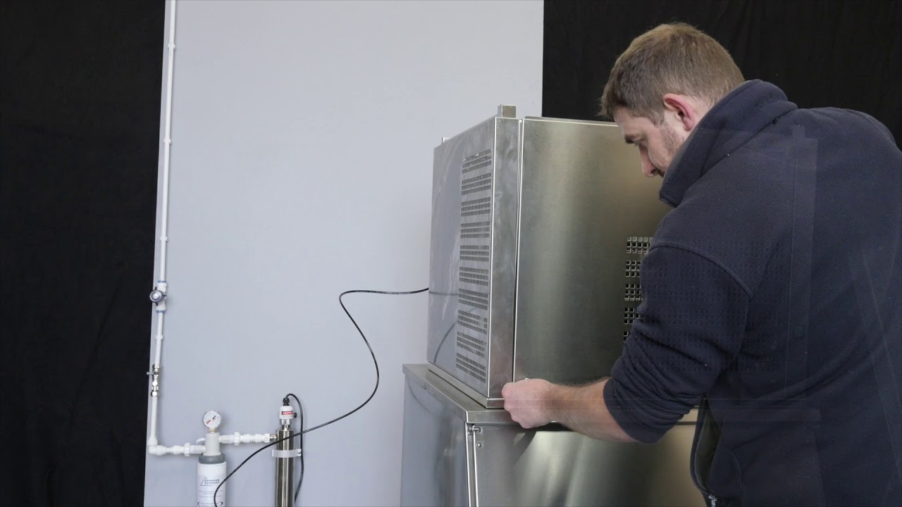 Installing a small machine onto a slope fronted bin - YouTube