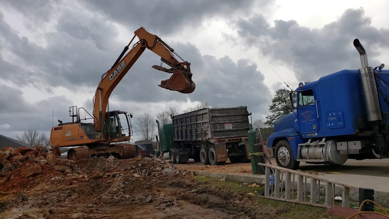 heavy equipment/ case Excavator loading w/o dropping your thumb - YouTube