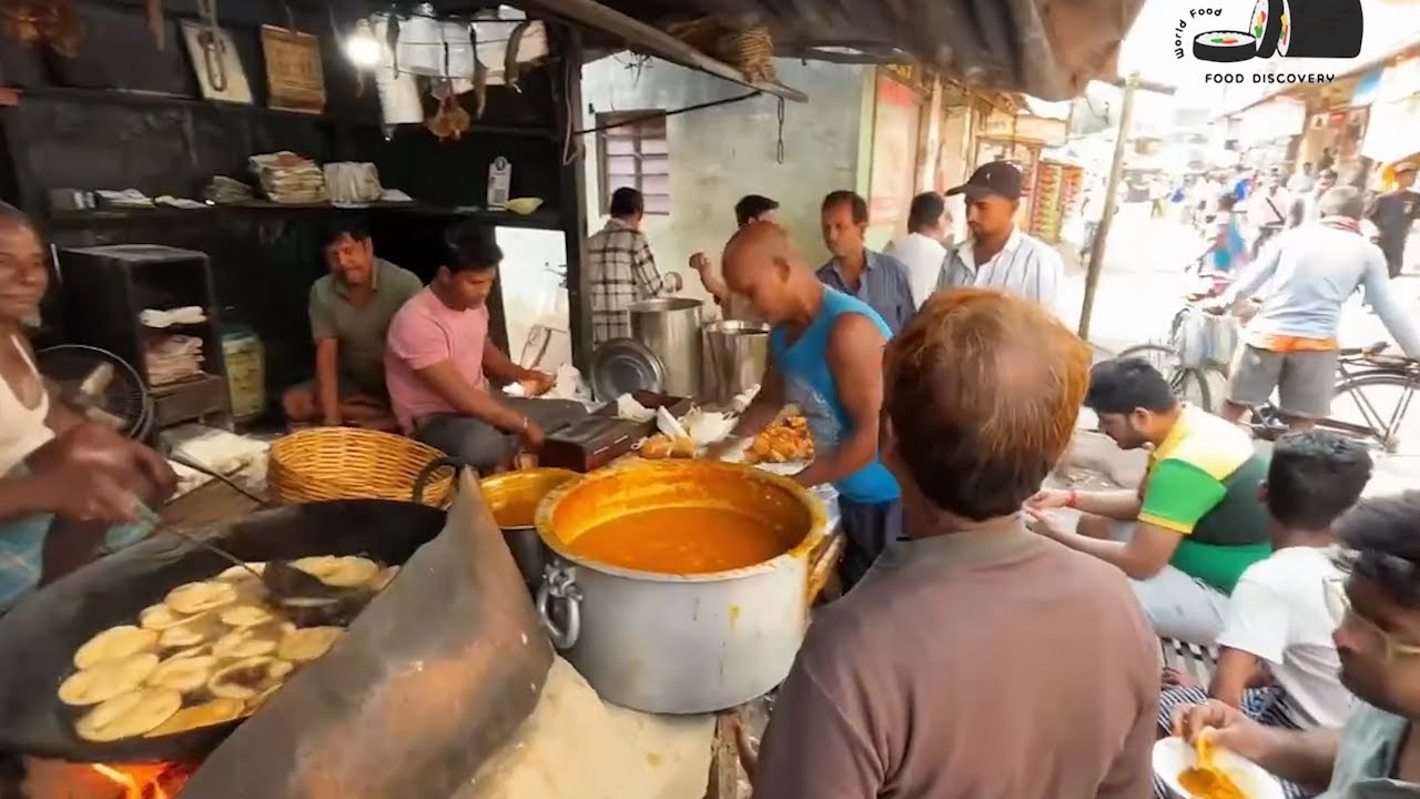 In a slum with a population of 15 million, the workers’ breakfast is ...
