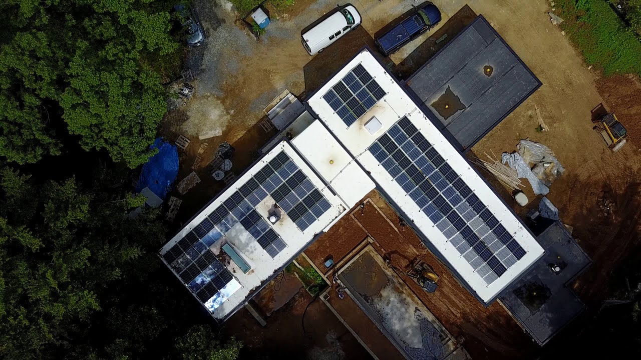 Resident Solar With East-West Flat Roof Racking! - YouTube