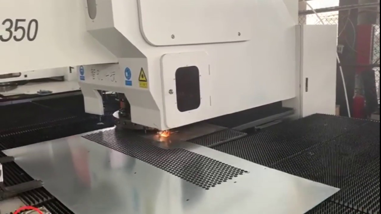 Turret punch laser cutting combined machine - YouTube