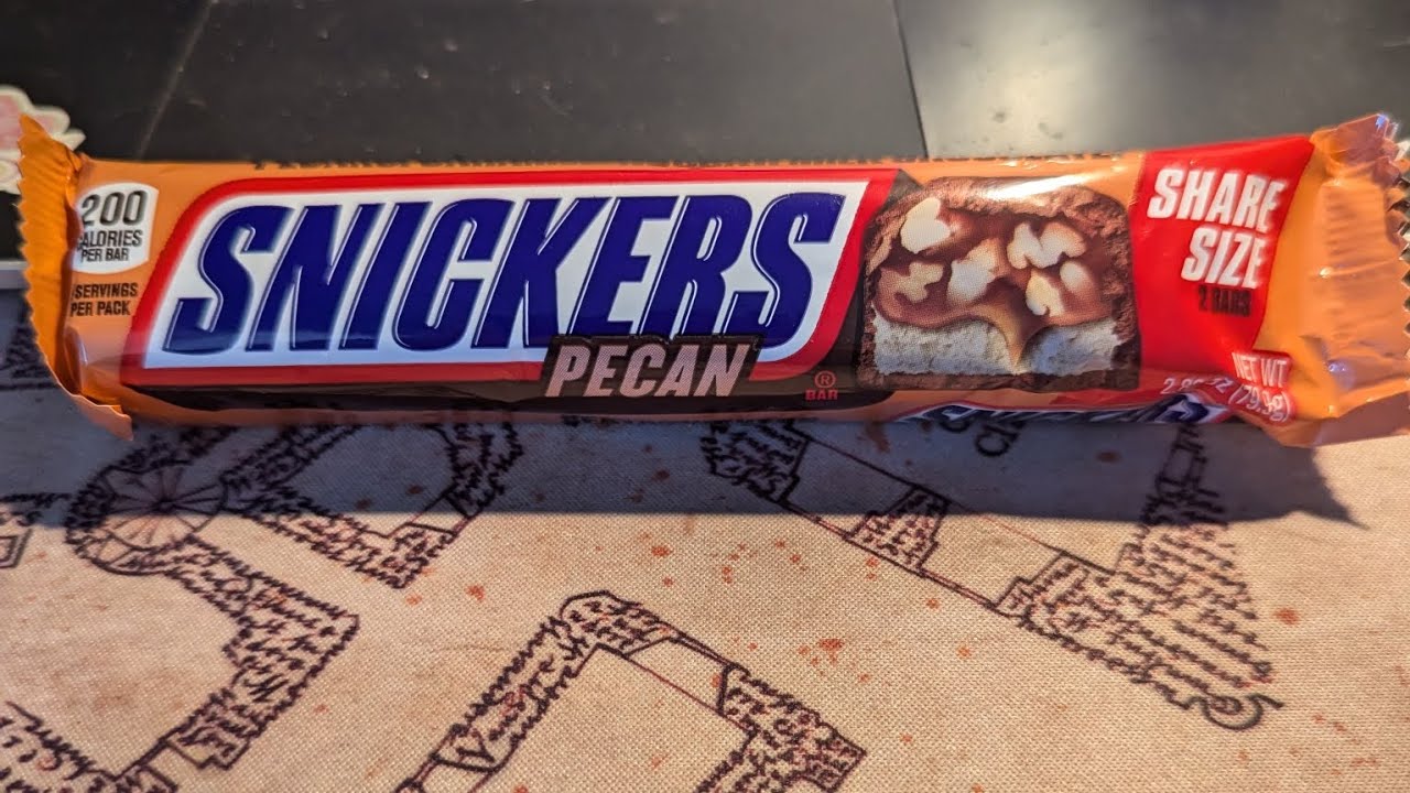 FoodCat reviews the new Pecan Snickers bar #snickers - YouTube
