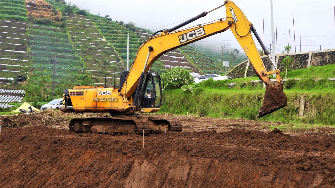 Digging A Big Pond With A JCB JS205 Excavator - YouTube