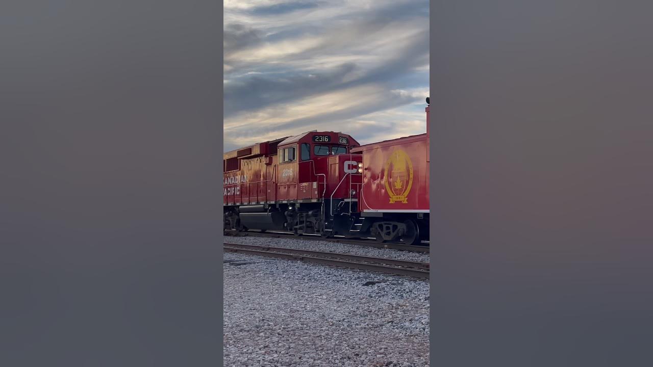 CP 2316 pushes a Caboose past B17 - YouTube