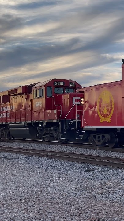 CP 2316 pushes a Caboose past B17 - YouTube