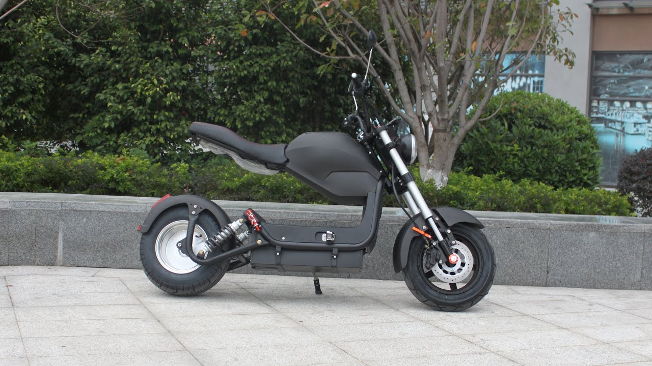 Electric scooter with fat boy in UK - YouTube