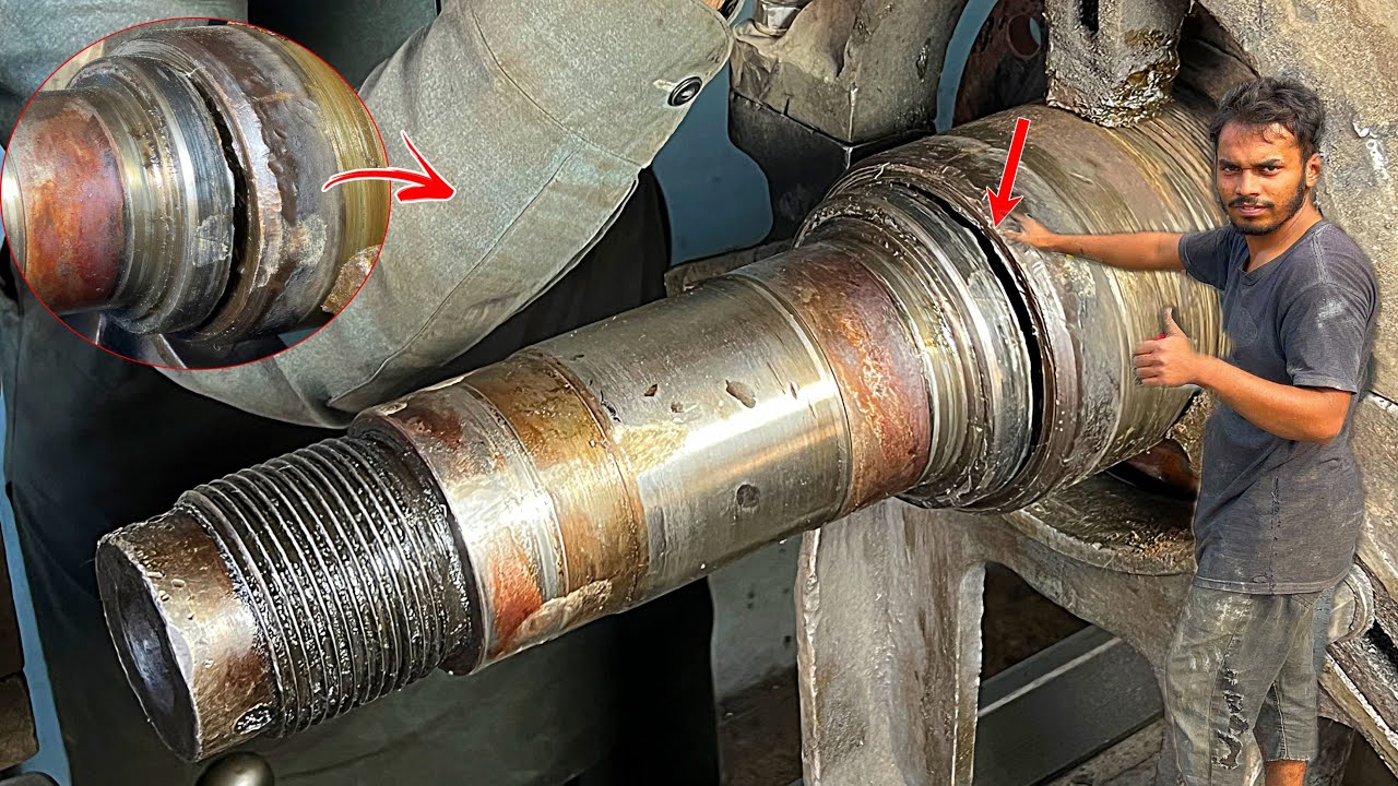 Expert Mechanic Working on Fixing Severe Rear Axle Failure of Heavy ...