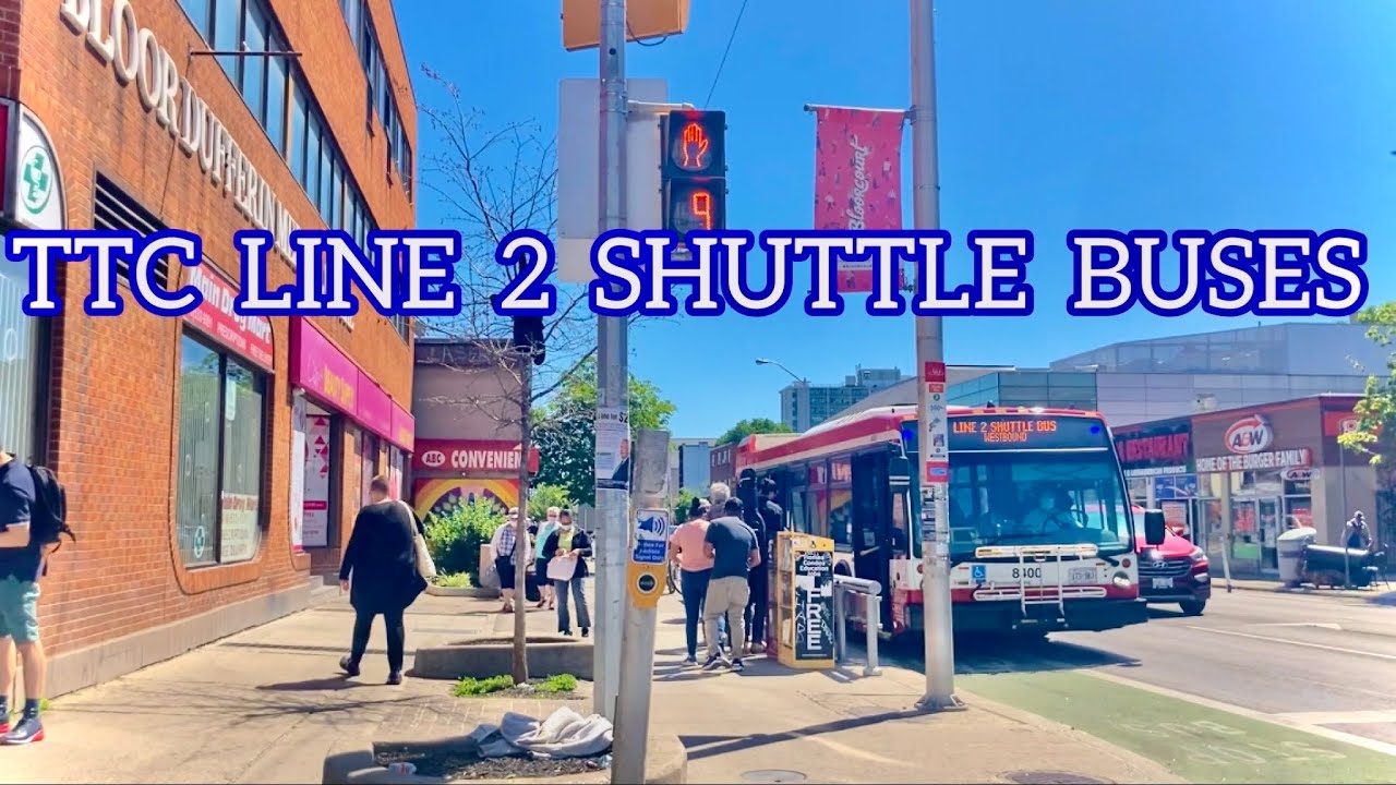 TTC LINE 2 SHUTTLE BUSES HEADED WESTBOUND AND EASTBOUND ALONG BLOOR ST ...