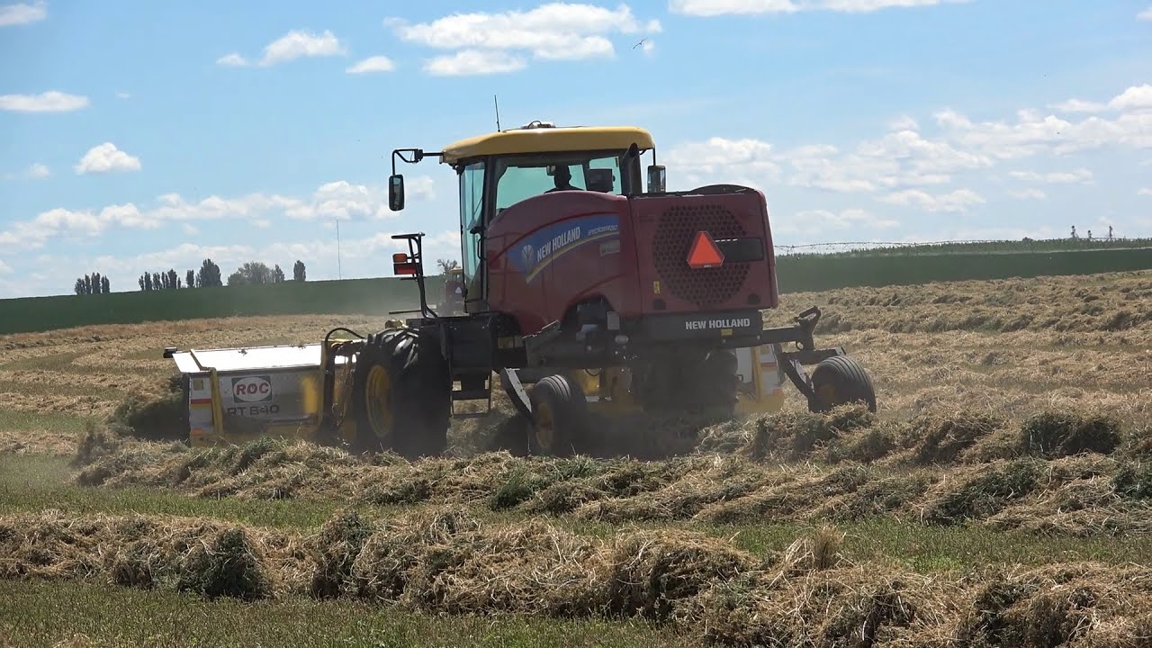 ROC_RT 840 MERGER with New Holland swather in Alfalfa field in Oregon ...