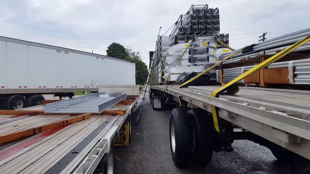 Prime Inc Flatbed playing in the rain - YouTube