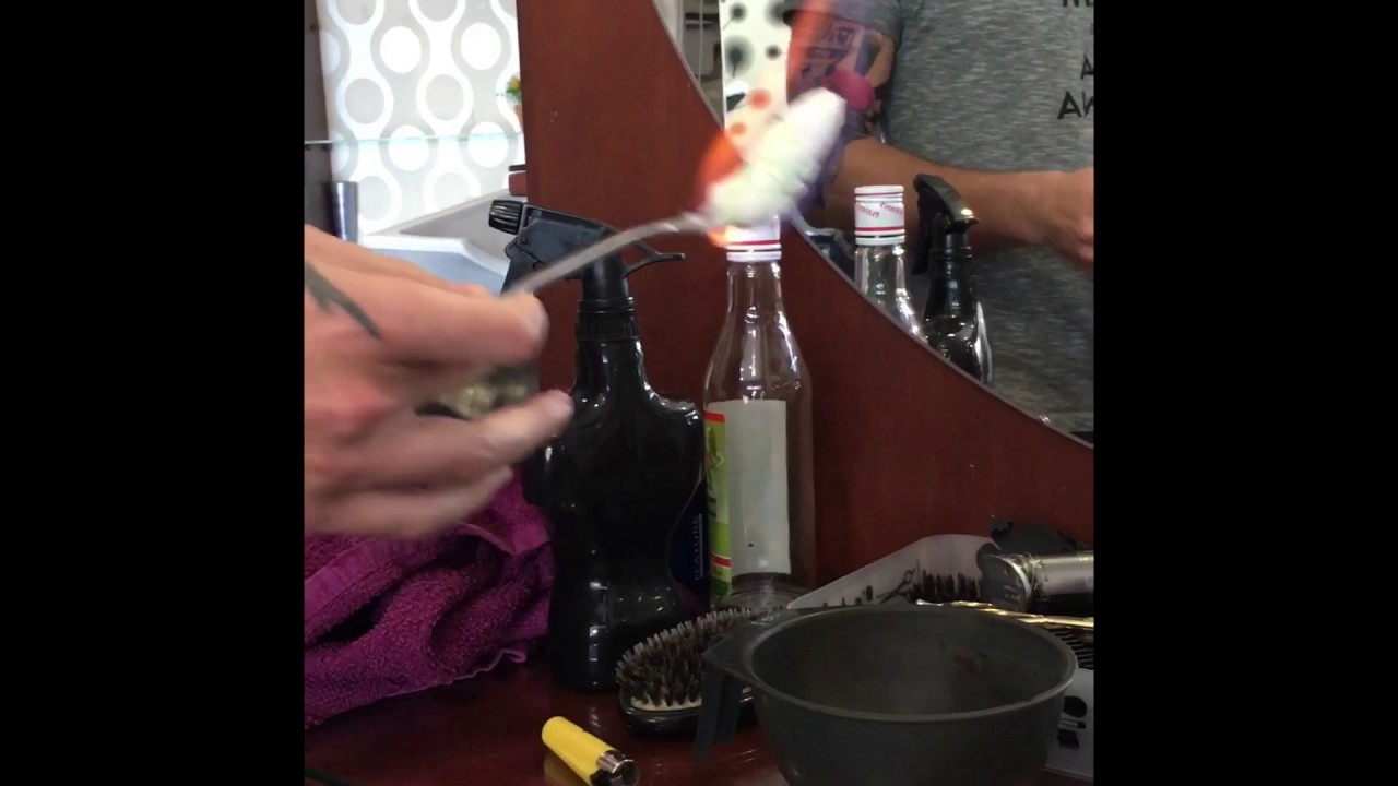 Burning off the split ends - YouTube