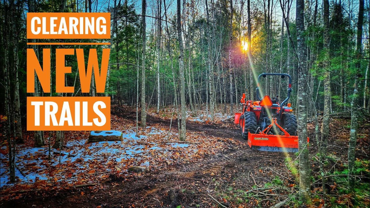 Clearing Trails with a Compact Tractor - YouTube