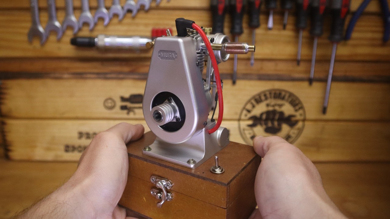 Having fun with a tiny 2.7cc vintage style four stroke engine. - YouTube