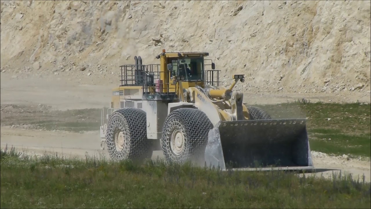 Huge Komatsu WA800 loader cleans road - YouTube