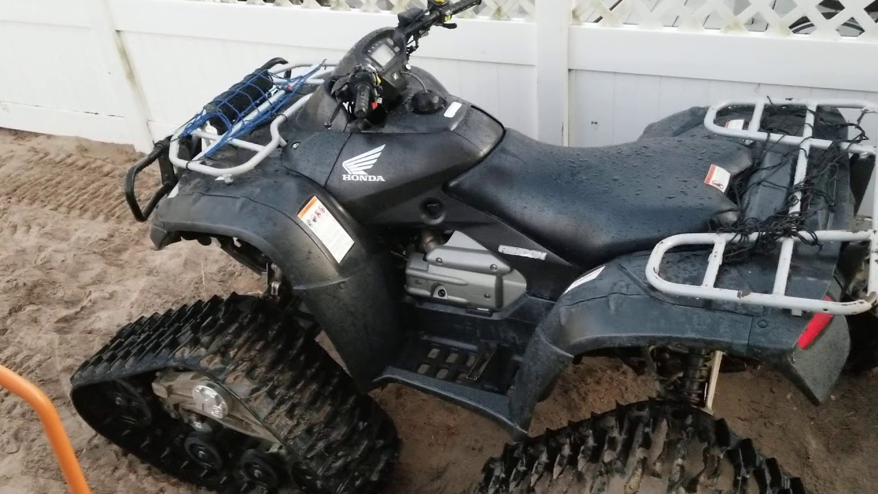 Honda rincon 4x4 w awesome tracks on it. - YouTube