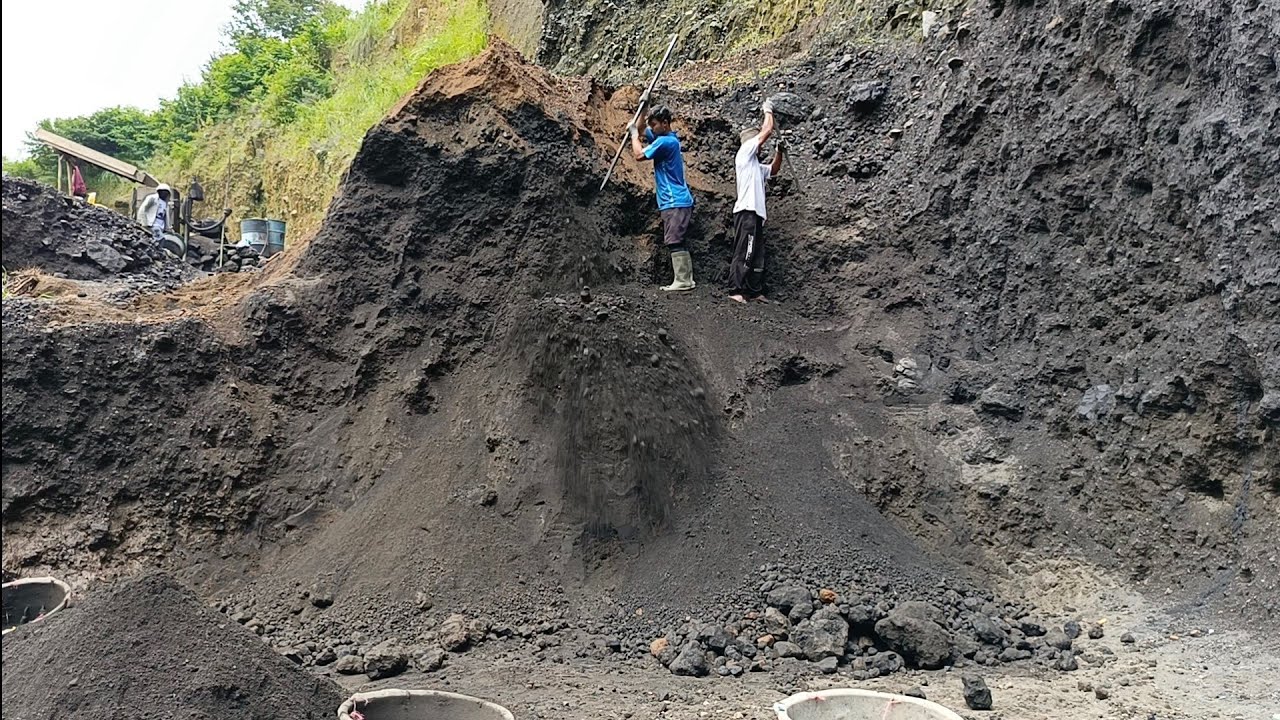 two miners digging for sand - YouTube