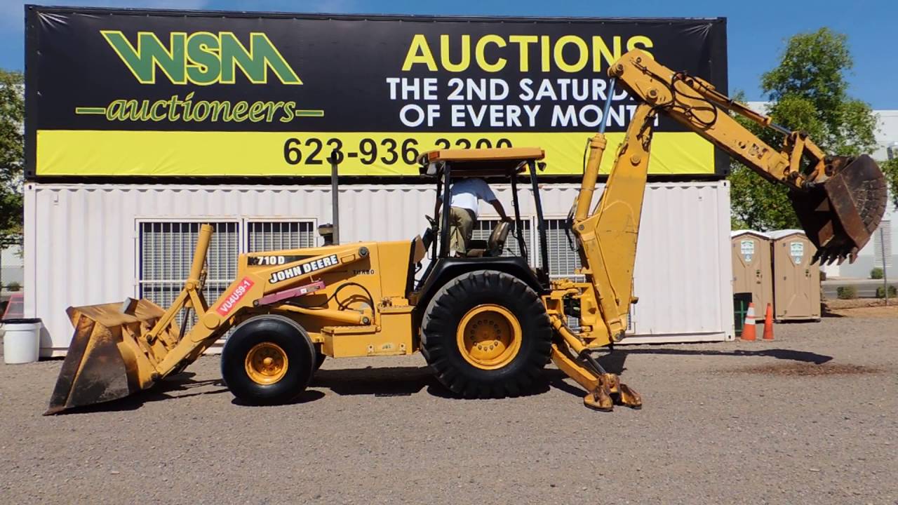 John Deere 710D Extend-a-hoe Loader Backhoe at Public Auction - YouTube