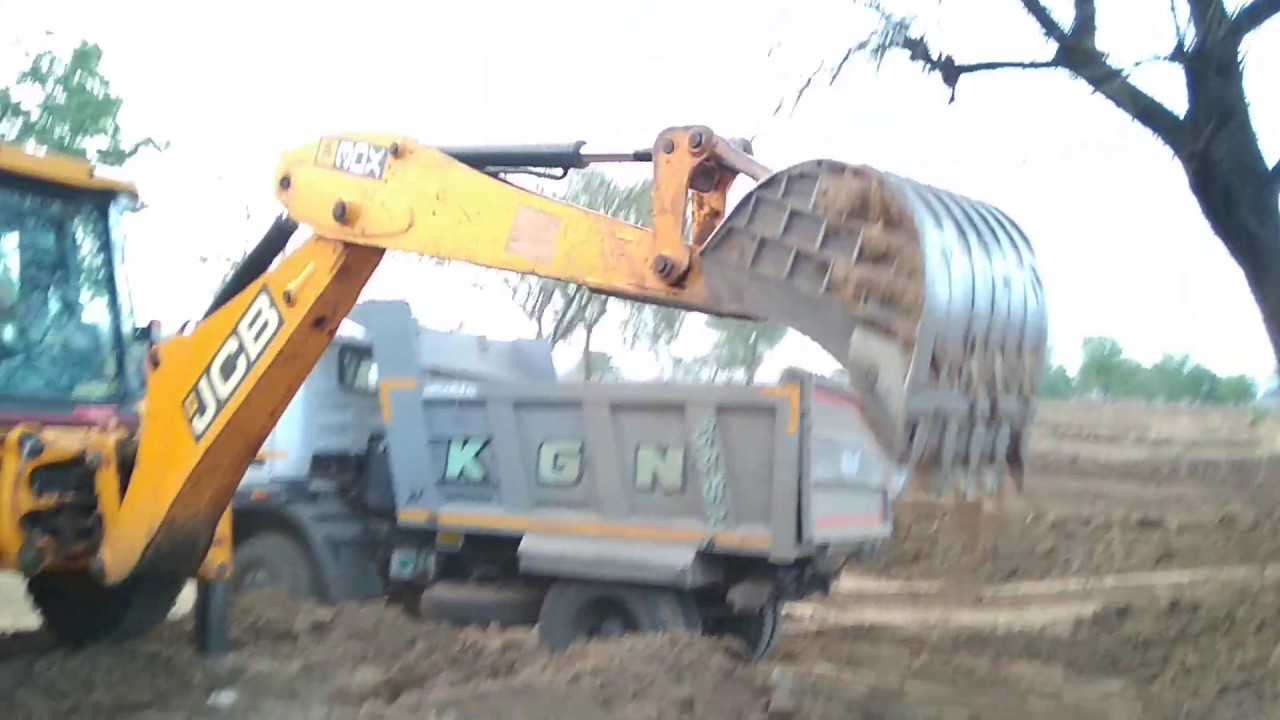 JCB Backhoe Machine Pushing Soil and JCP - JCB 3DX Widening Village JCB ...