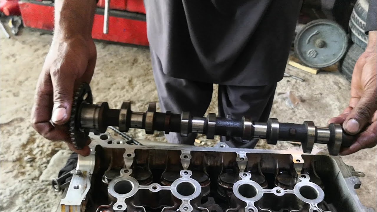how to 2nz engine head valve fitting - YouTube