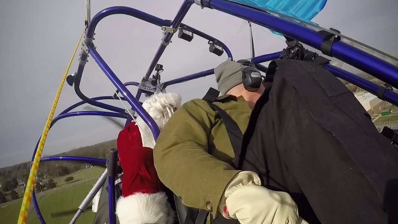 Santa’s in a flying parachute! - YouTube