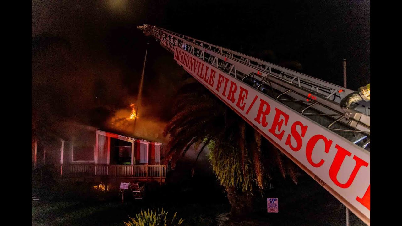 JFRD responds to fire of a business on stilts - YouTube