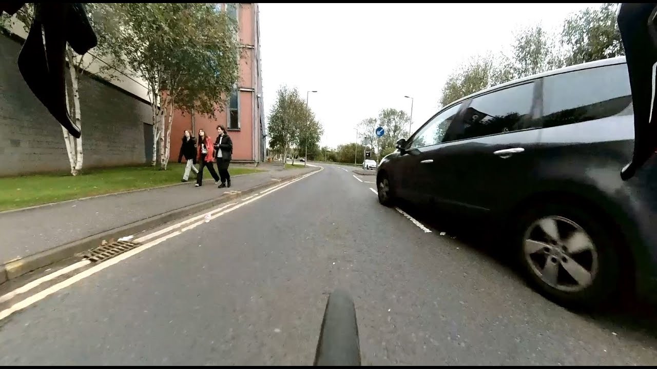 Entitled cyclist holds up hard working driver - YouTube