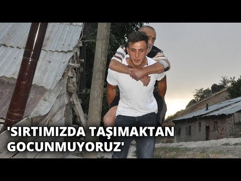Oğullarının sırtında taşıdığı babanın tek isteği akülü araç