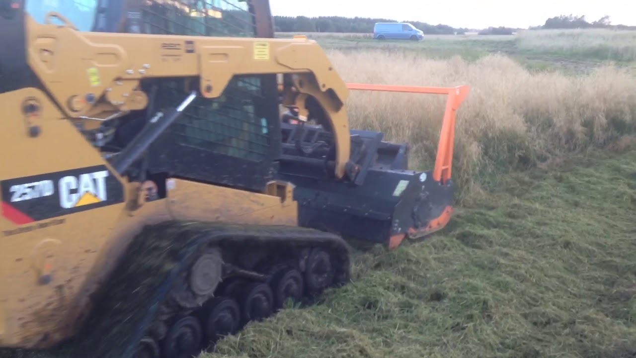 Cat 257D tmc mulcher - YouTube