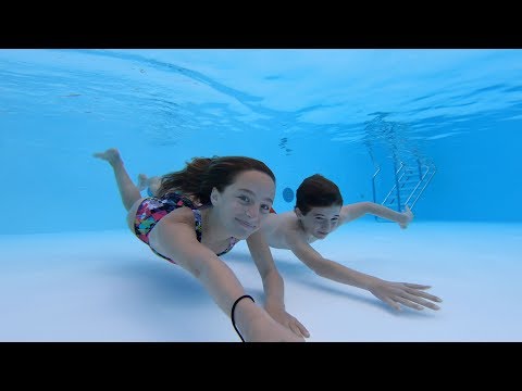 Carla Underwater swiming with Alex Underwater