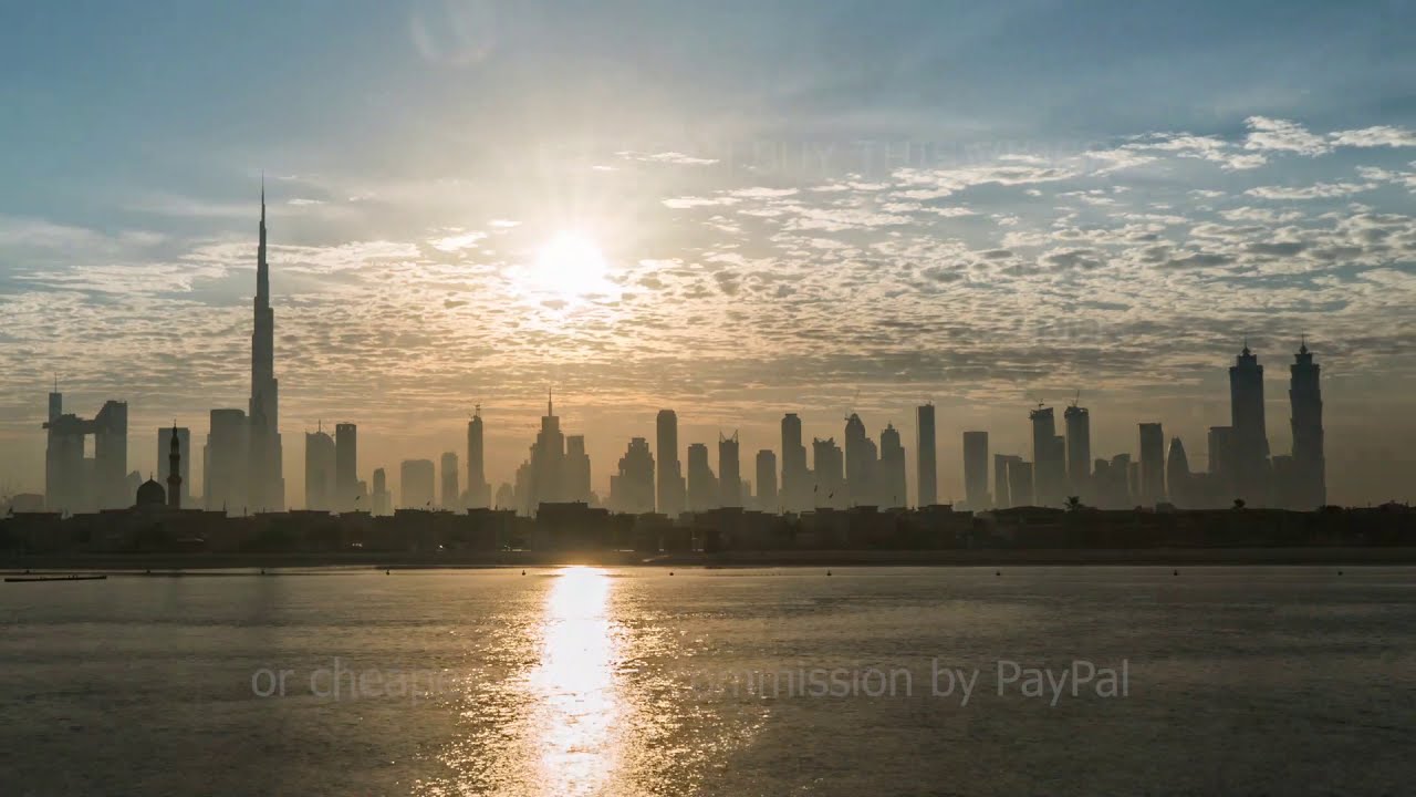 Sunrise in Dubai timelapse time lapse. Dawn, sun rises over Burj ...